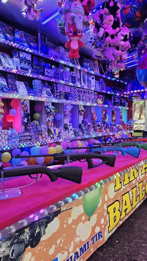 Colorful Fun Fair Guns Stand Editorial Stock Photo - Image of colorful ...