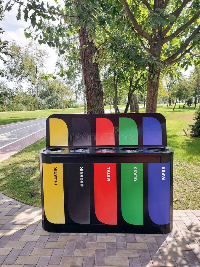 Colorful garbage cans stock photo. Image of outdoor - 335494576