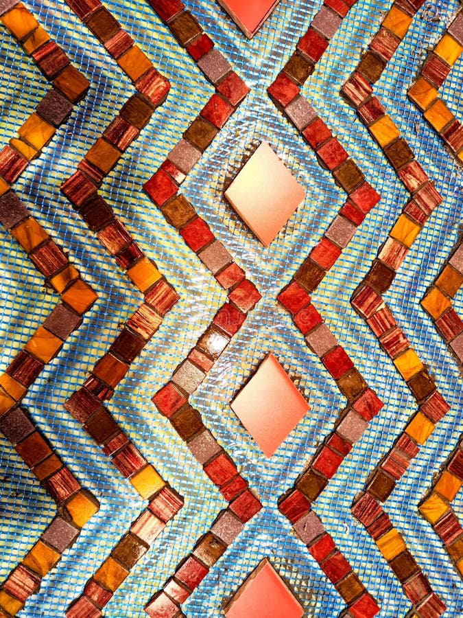 Colorful Geometric Mosaic Pattern with Vibrant Textures and Reflective Surfaces that Create ...
