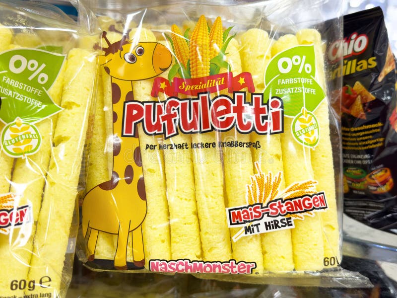 Colorful Giraffe Snack Packaging with Corn Design in Supermarket ...