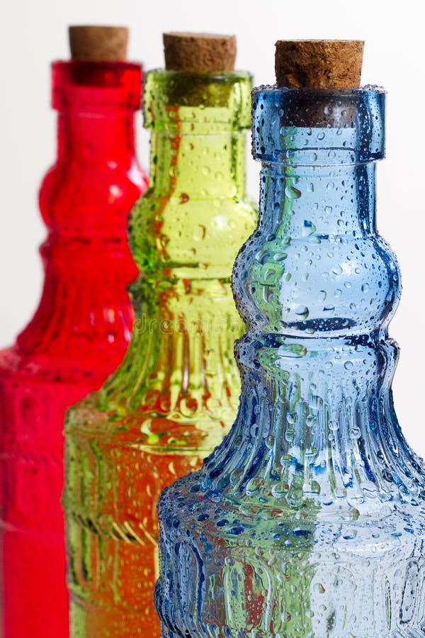 Colorful Glass Bottles with Water Drops Stock Image - Image of refresh ...