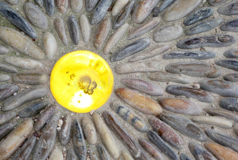 The Colorful Glass Light in the Ground with Stones Stock Image - Image ...