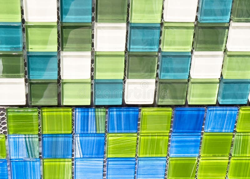 Colorful Glass Tiles with Green and Blue Patterns in a Grid Layout ...