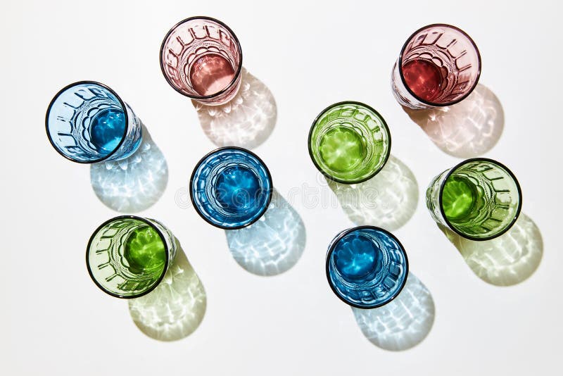 Colorful Glasses in the Sunlight with Shadows Stock Image - Image of ...