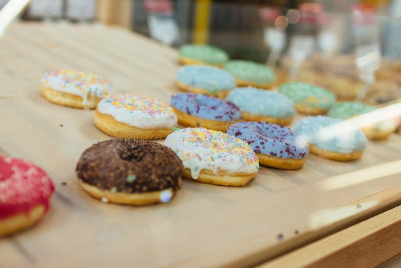 Colorful Glazed Sweet Donuts in Shop Stock Photo - Image of cupcake ...