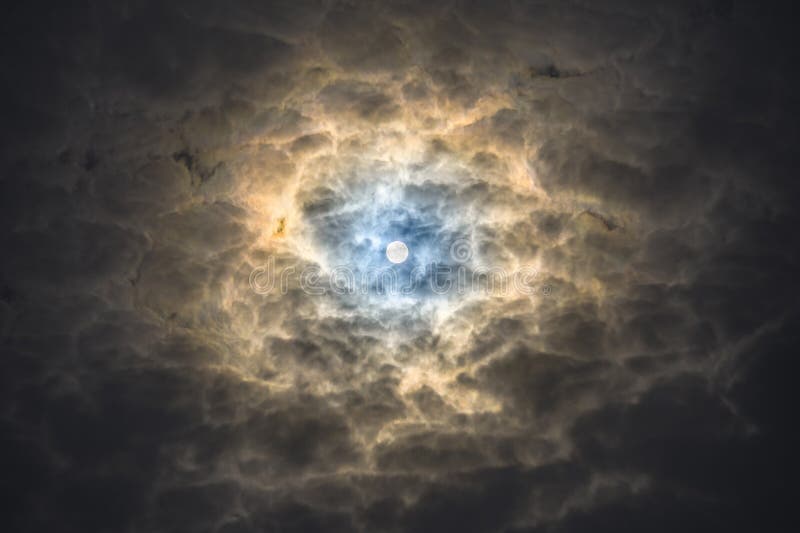 A Colorful Glow on the Clouds Around the Moon, the Night Sky Covers the ...