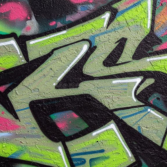 Colorful Graffiti on a Textured Wall Features Abstract Forms with Sharp ...