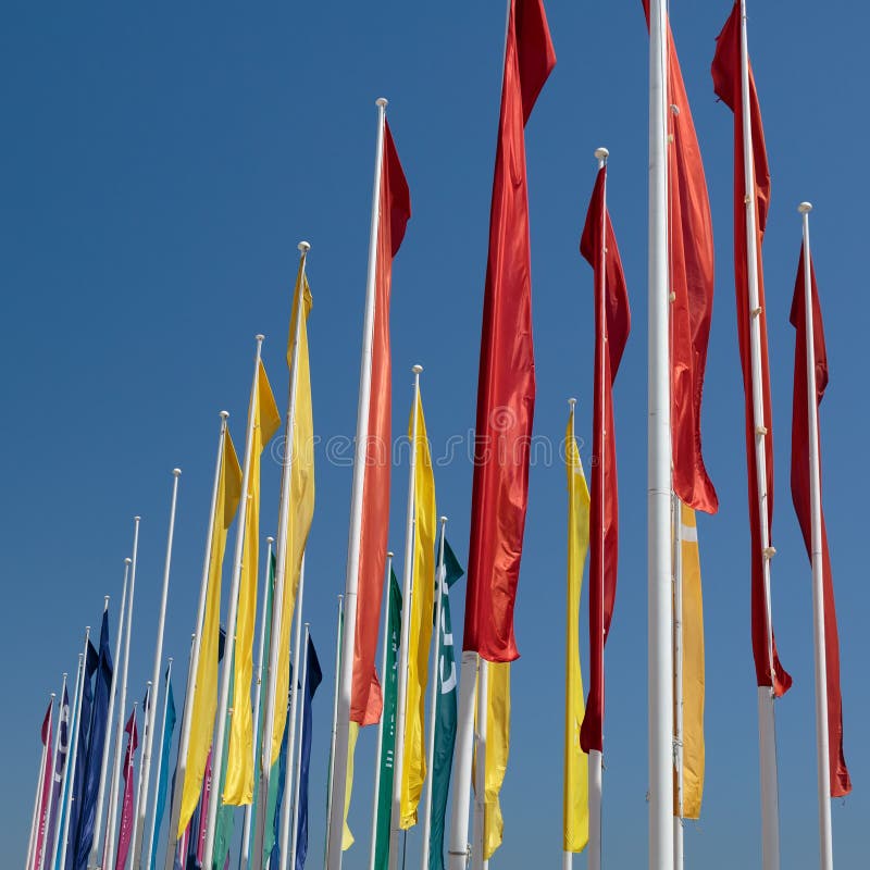 Colorful Groups of Flags Against Blue Sky Stock Image - Image of tall ...