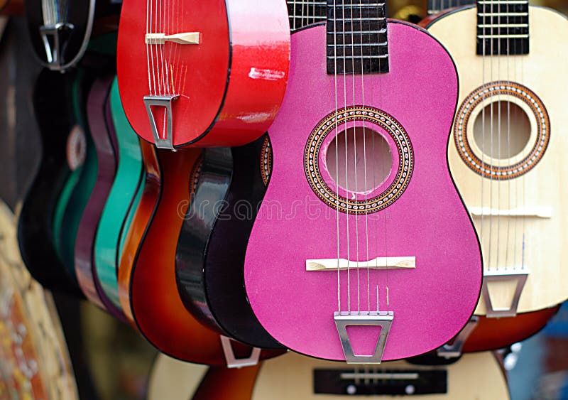 Colorful Guitars in Musical Instruments Shop Stock Photo - Image of ...