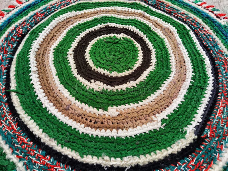 Colorful Handmade Circular Textile with Intricate Patterns on a Light ...
