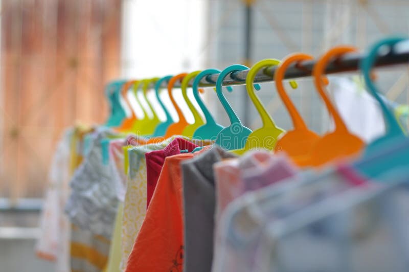 The Colorful Hangers are Arranged in a Neat and Orderly Manner. Stock ...