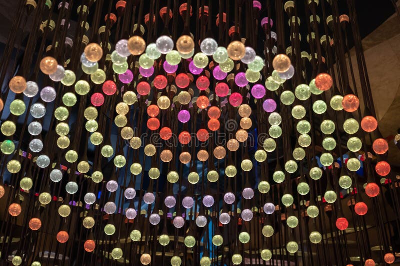 Colorful Hanging Light Bulb Stock Photo - Image of glowing, bright ...