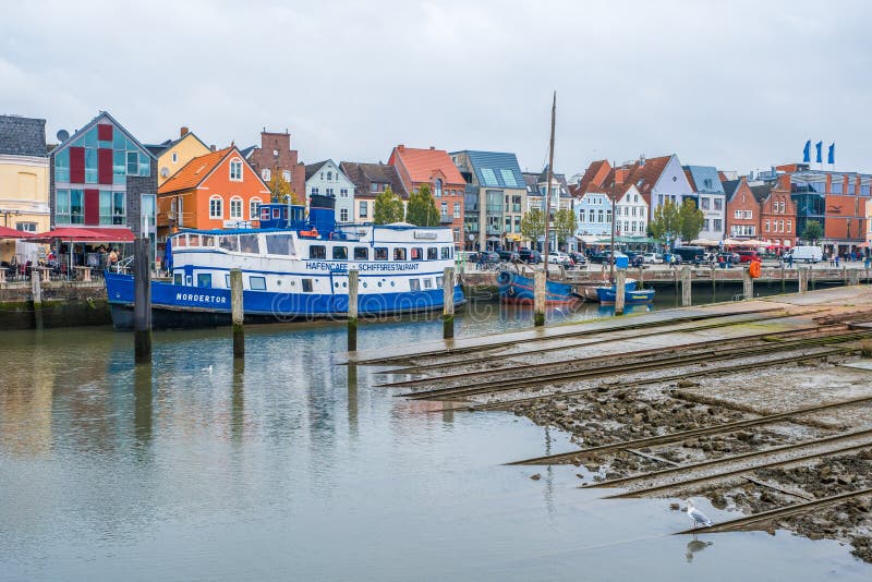 Colorful Harbor and Market Square in Husum, Germany Editorial ...