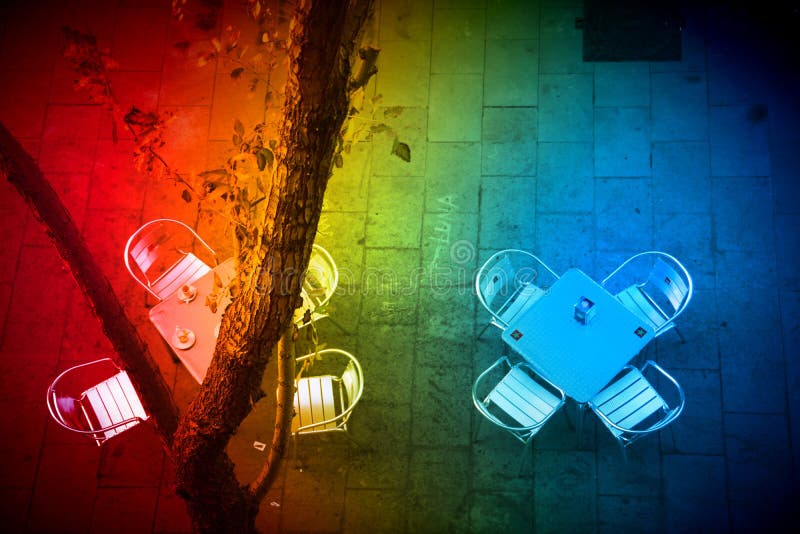 Colorful High Angle Shot of Two Cafe Tables in the Street Stock Image ...