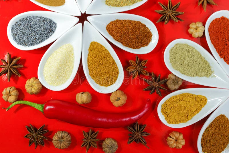 Colorful Indian Spices on Red Background Stock Image - Image of ...