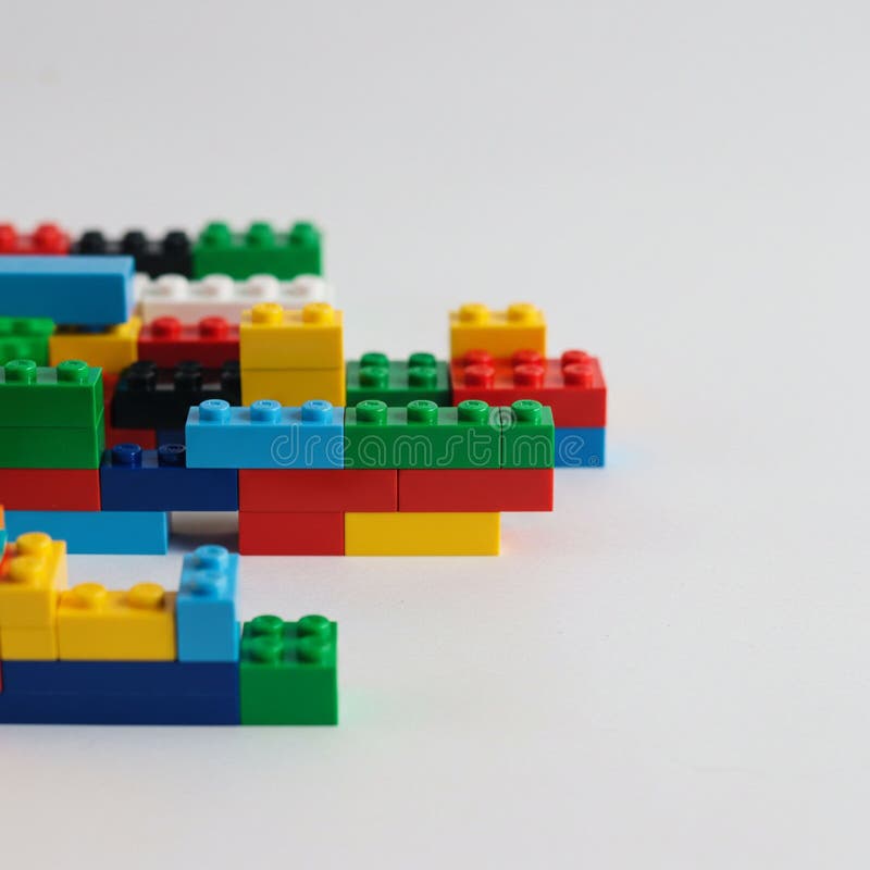 Colorful Interlocking Plastic Building Blocks Arranged on a White ...