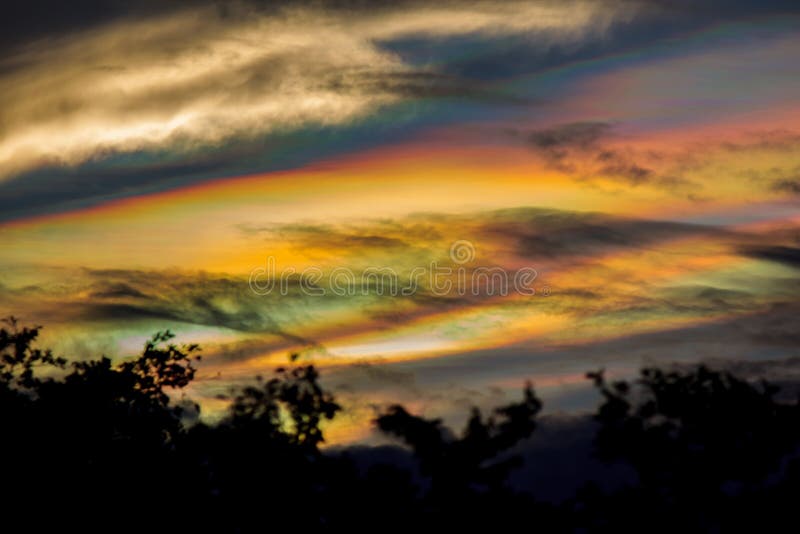 Iridescent cloud stock photo. Image of sunsetinthailand - 75182900