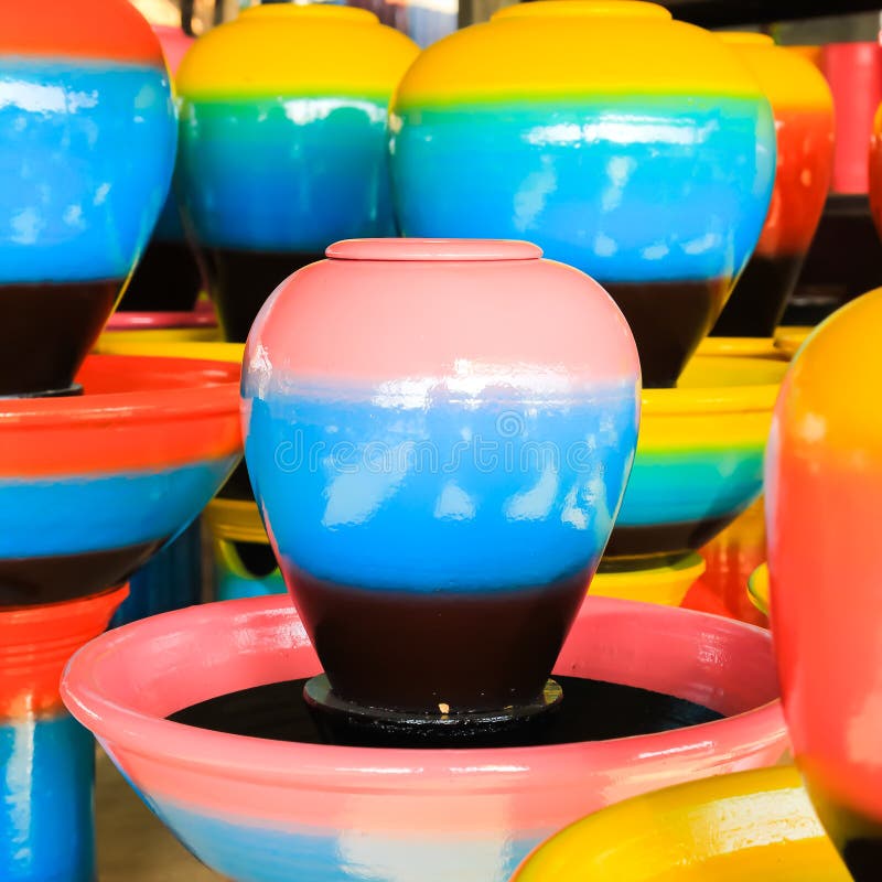 Colorful jars stock image. Image of hand, design, crockery - 39572769