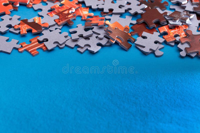 Colorful Jigsaw Puzzle on Blue Background Stock Photo - Image of ...