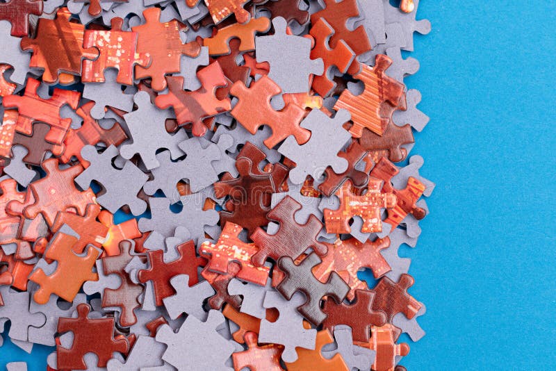 Colorful Jigsaw Puzzle on Blue Background Stock Photo - Image of ...