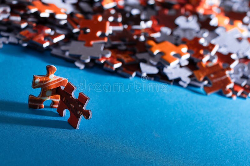 Colorful Jigsaw Puzzle on Blue Background Stock Photo - Image of solve ...