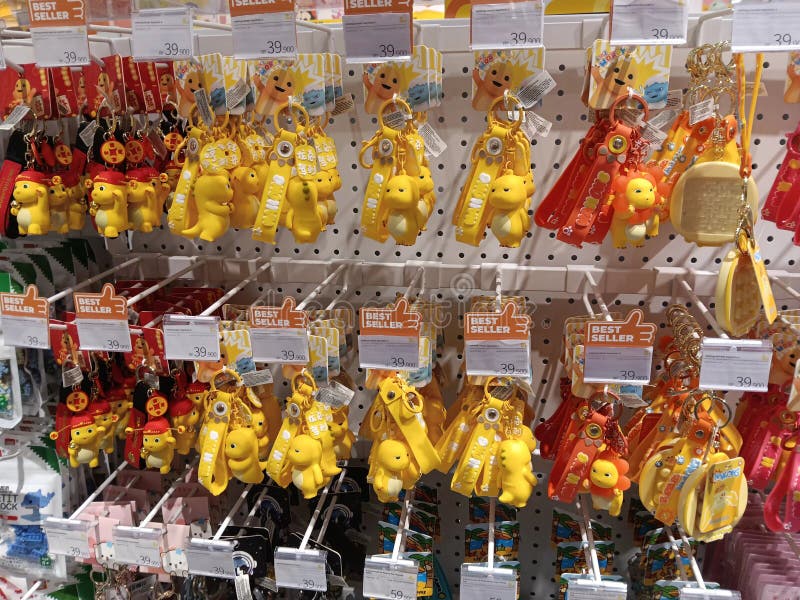 Colorful Keychains Displayed in a Retail Store, Featuring Cartoon ...
