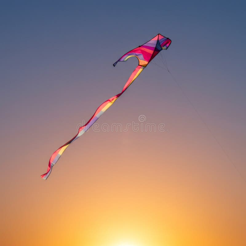 Colorful Kite Flying in a Vibrant Sunset Sky Stock Illustration ...