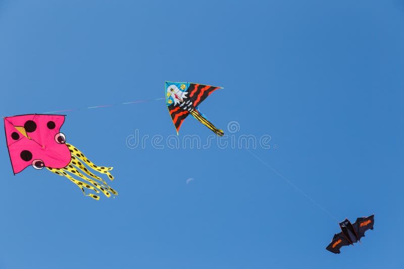 Three kites in sky stock photo. Image of motion, high - 12453212