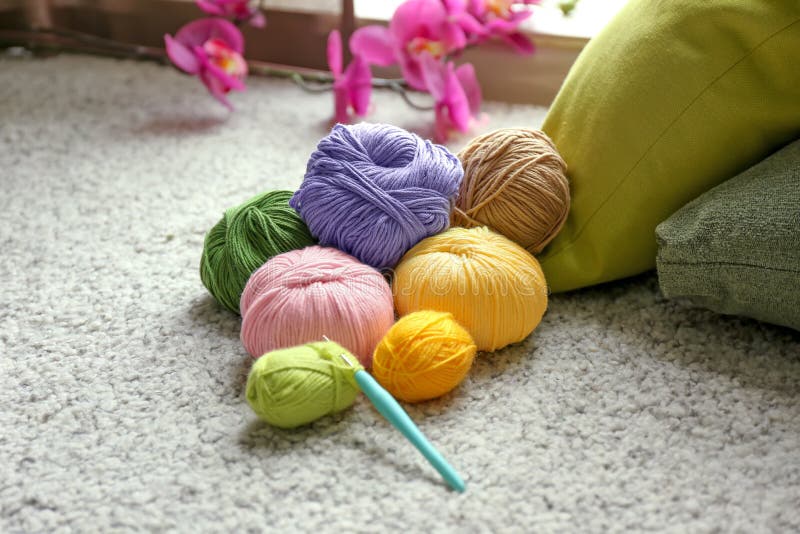 Colorful Knitting Yarns and Crochet on Carpet Stock Image - Image of ...