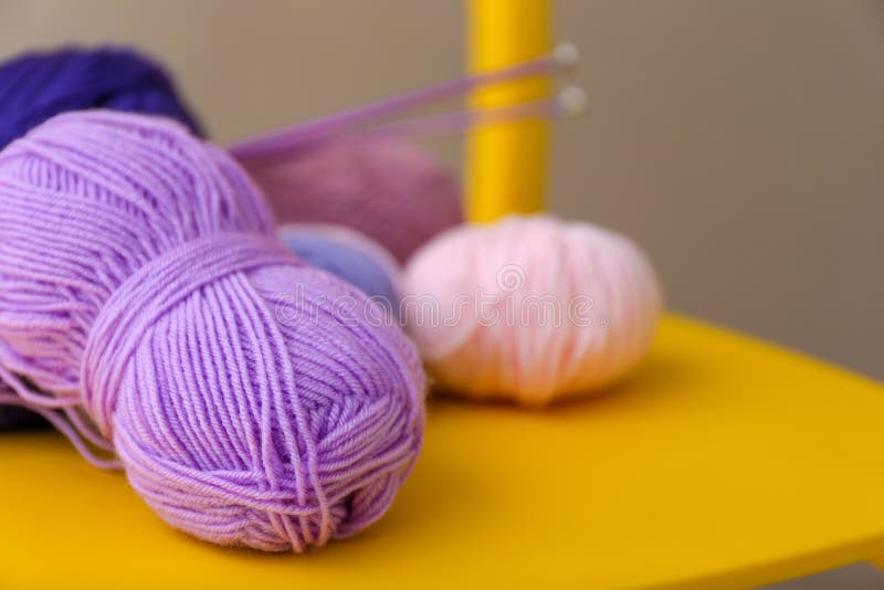 Colorful Knitting Yarns on Table Indoors Stock Photo - Image of purple ...