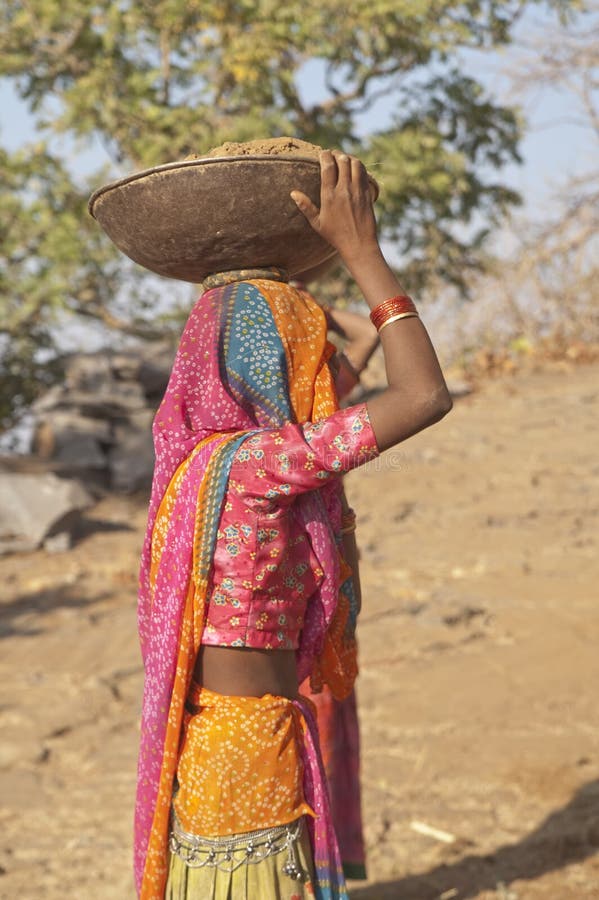Woman laborer editorial stock photo. Image of lifting - 34785663
