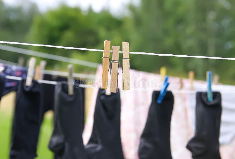 Colorful Laundry Hanging on the Rope Outdoors Stock Image - Image of ...