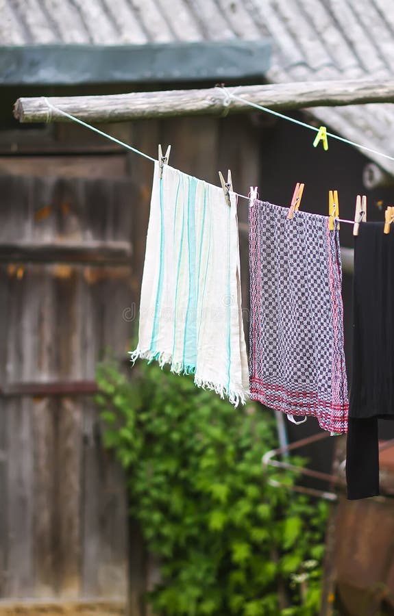 Colorful Laundry Hanging on the Rope Outdoors Stock Image - Image of ...