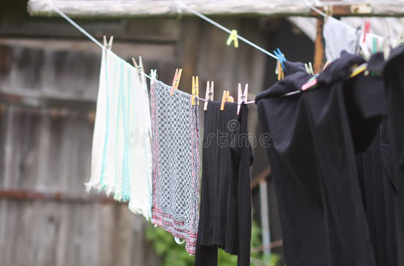 Colorful Laundry Hanging on the Rope Outdoors Stock Image - Image of ...