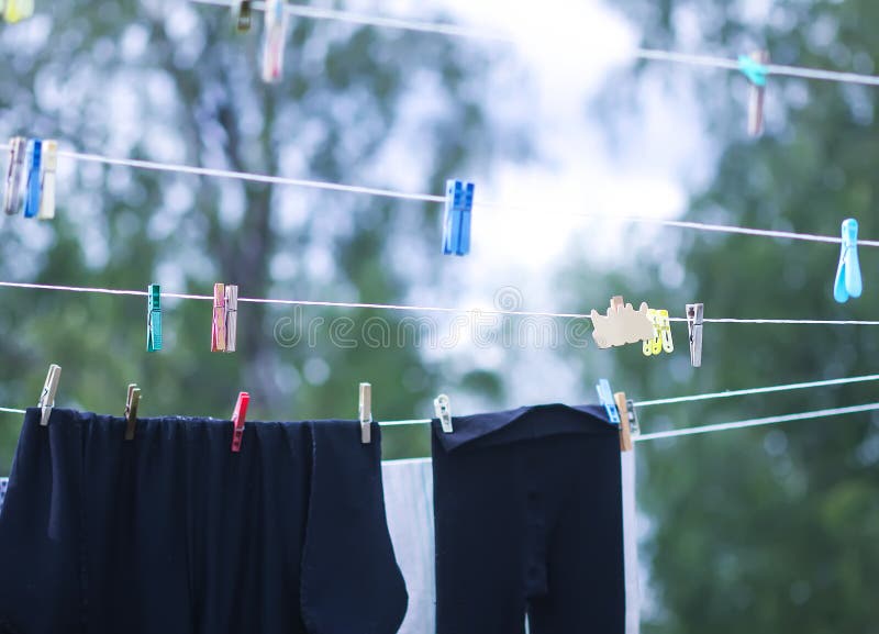 Colorful Laundry Hanging on the Rope Outdoors Stock Image - Image of ...