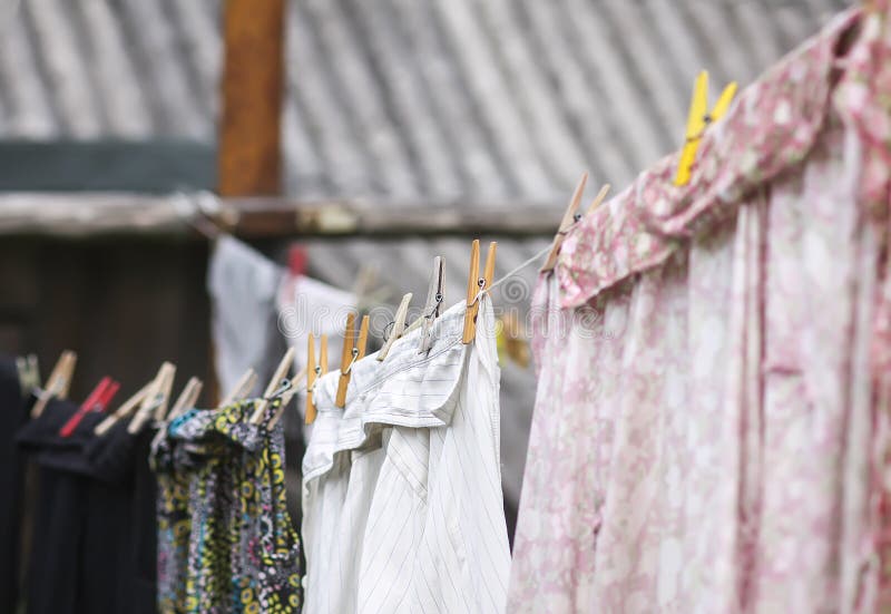 Colorful Laundry Hanging on the Rope Outdoors Stock Photo - Image of ...