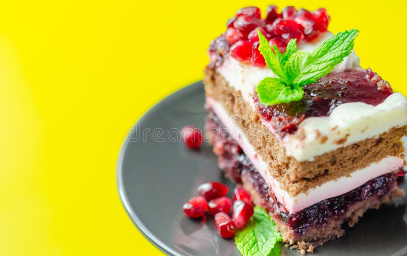 Colorful Layered Cream Chocolate Cake with Cherry Jam and Pomegranate ...