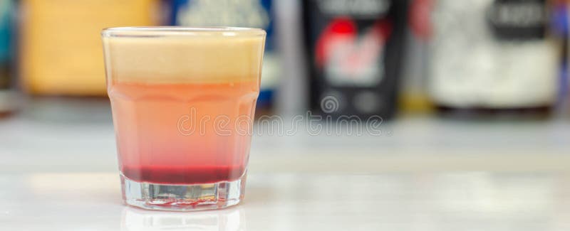 A Colorful Layered Drink Shot on a Bar Prepared by Bartender Stock ...