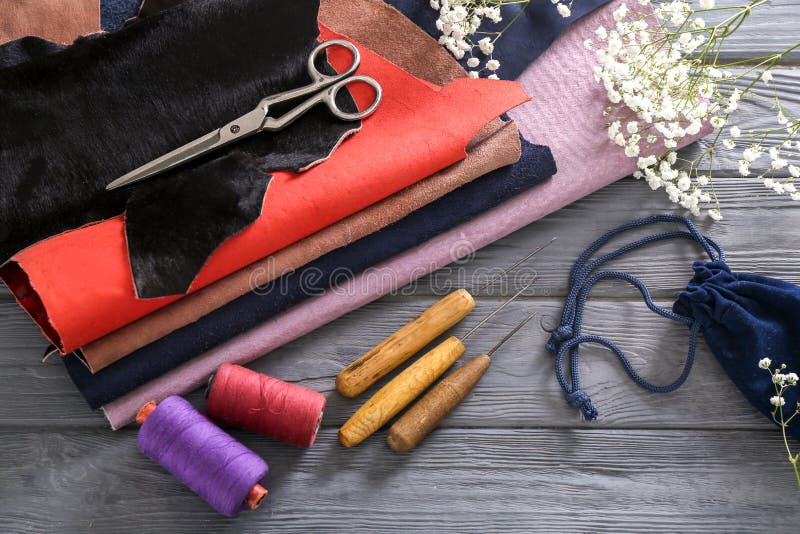 Colorful Leather with Craft Tools and Threads on Wooden Background ...