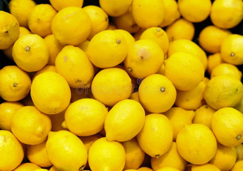 Colorful Lemons in Market stock photo. Image of acid - 40261718
