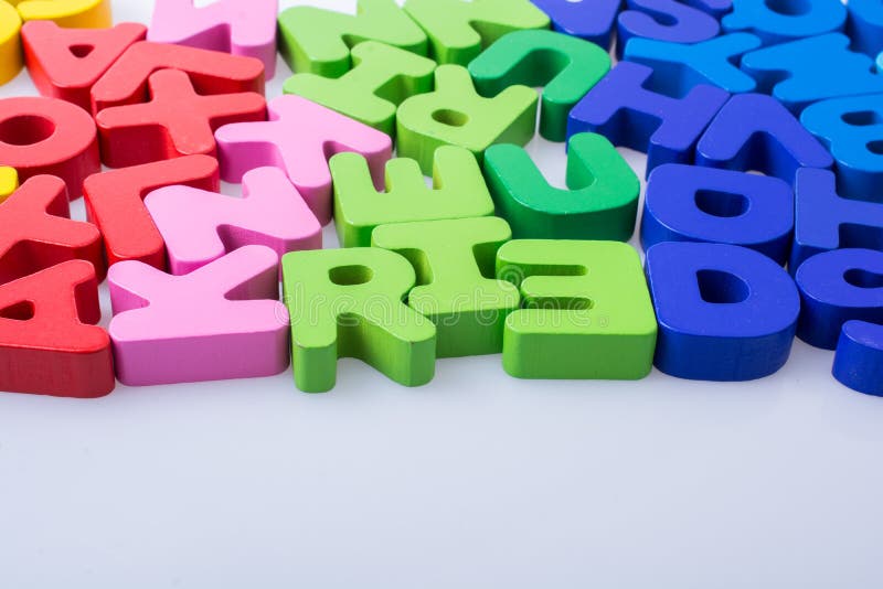 Colorful Letter Blocks Scattered Randomly on White Stock Image - Image ...
