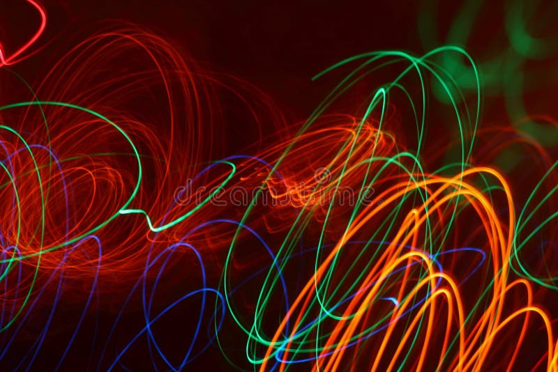 Colorful Light Rays Drawing the Abstract Patterns in the Dark Stock ...
