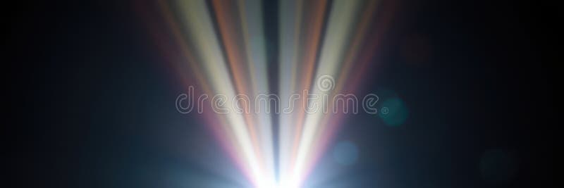 Colorful Light Rays Shining Upward Against a Dark Background Create a ...