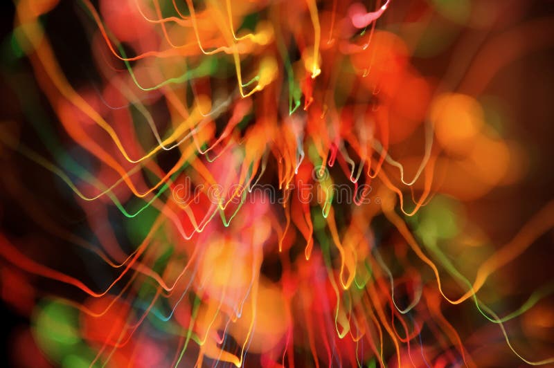 Colorful Light Trails in Abstract Patterns Against a Black Background ...