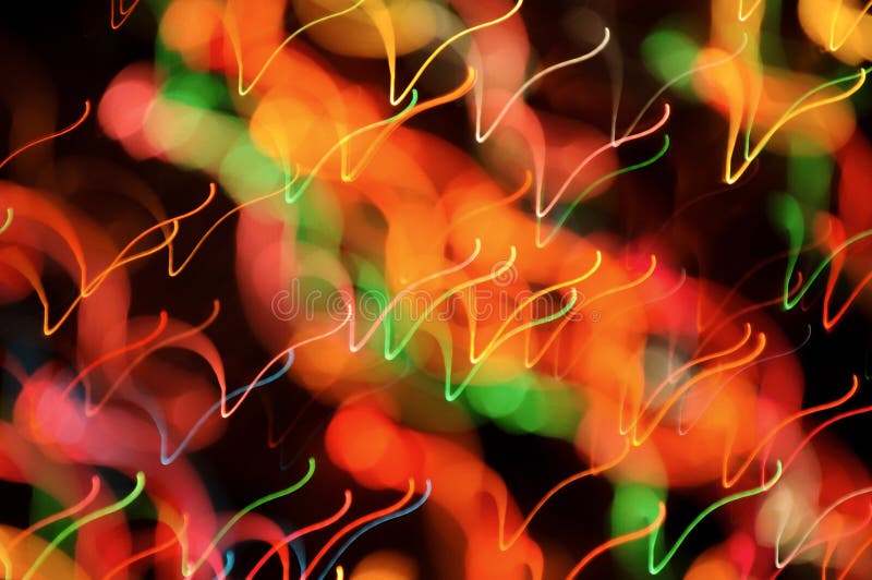 Colorful Light Trails in Abstract Patterns Against a Black Background ...