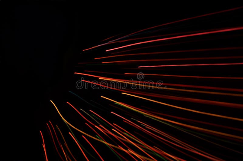 Colorful Light Trails Forming Lines Against a Black Background Stock ...