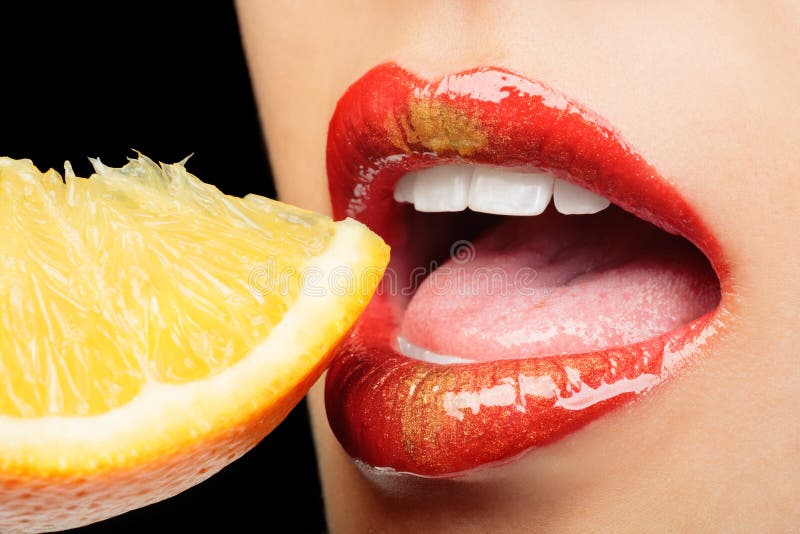 Colorful lips eating lemon stock image. Image of beautiful - 34931839