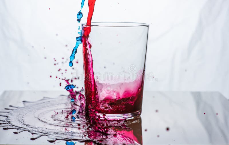 Colorful Liquid Splashing into Glass.. Stock Photo - Image of glass ...
