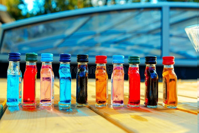 Colorful Liquids in Glass Bottles for Recreational Drinks Stock Image ...