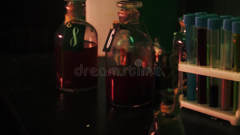 Colorful Liquids in Laboratory Glassware. Beakers and Flasks in the Lab ...